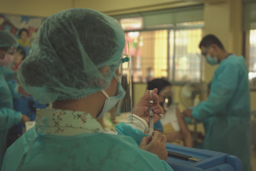 Mass hiring drove up the cost of delivering COVID-19 vaccines in the ...